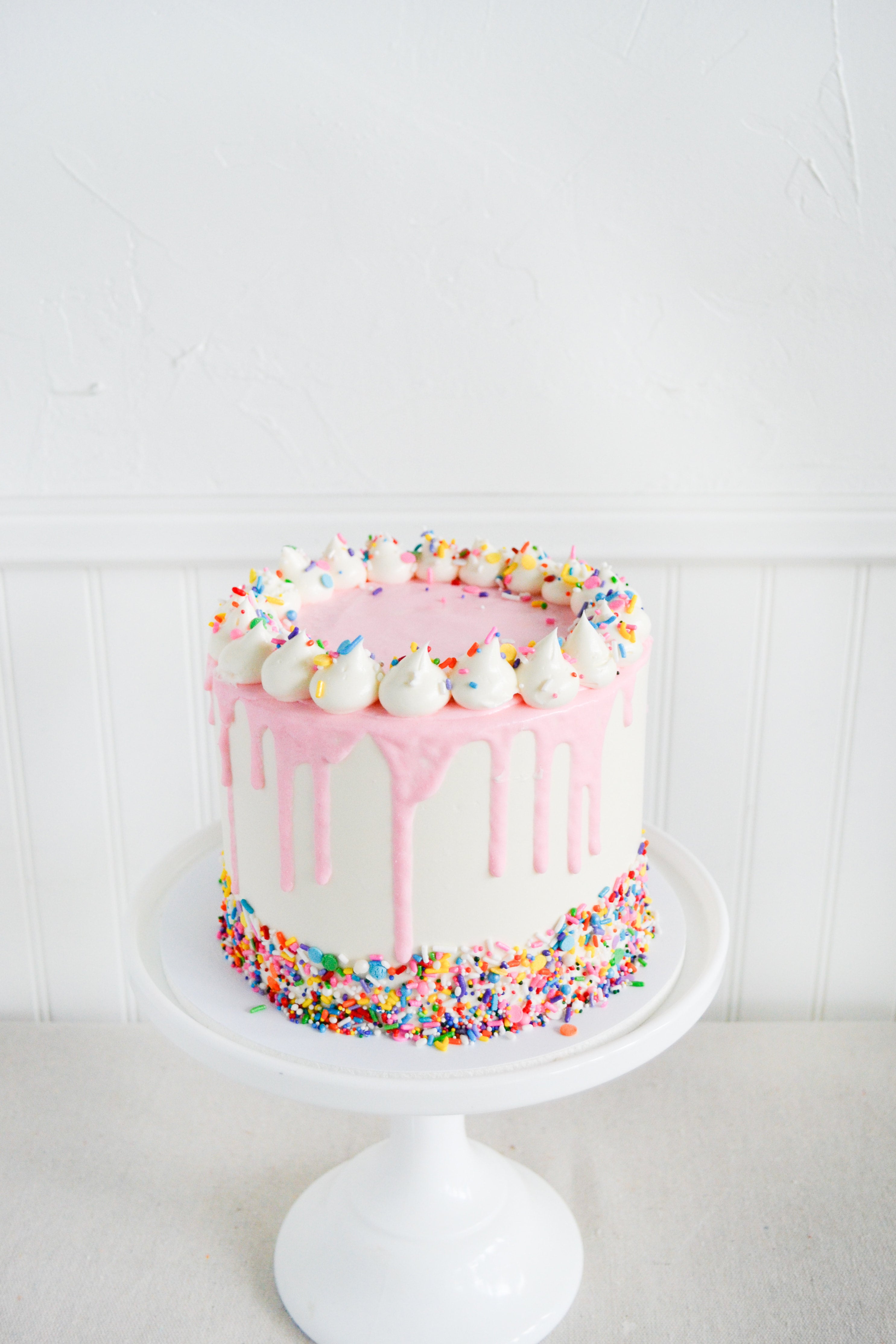 Sprinkle Drip Cake w/ Border | The SweetSide